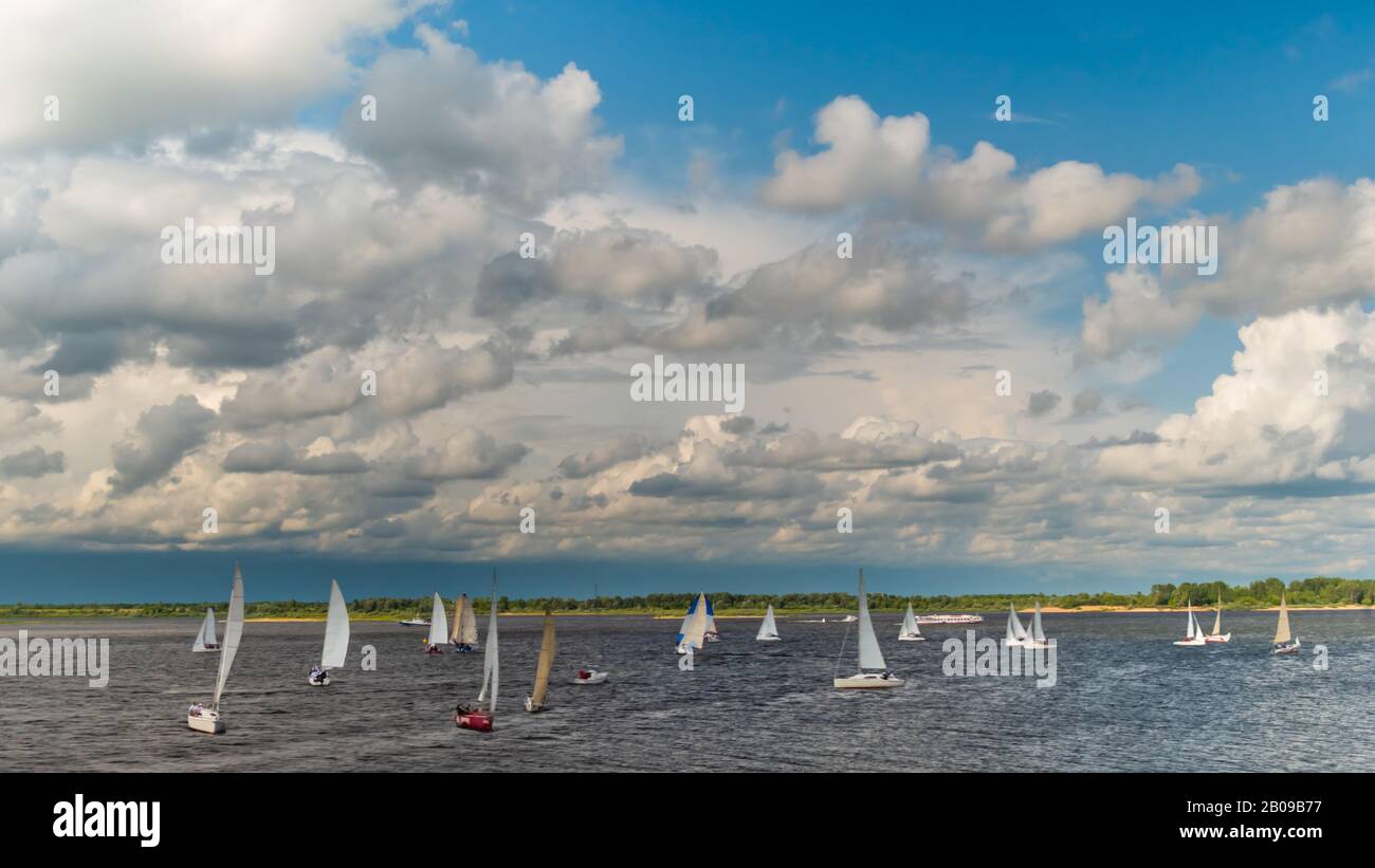 Sailing yachts at sport regatta competition race on river Stock Photo ...