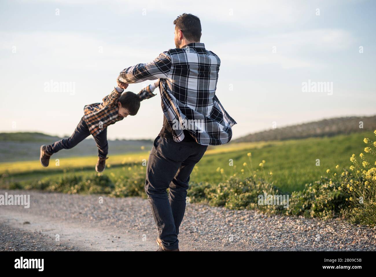 Child grabbing leg hi-res stock photography and images - Alamy