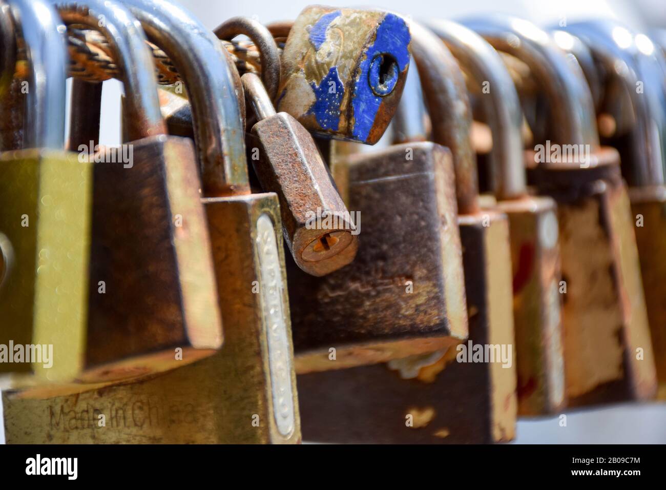 Rusty fence with padlocks attached hi-res stock photography and images ...