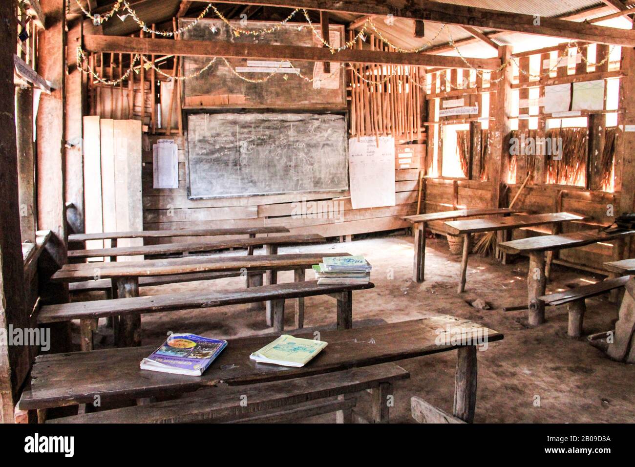 Education in Asia. A simply classroom in Laos on the shores of Mekong ...