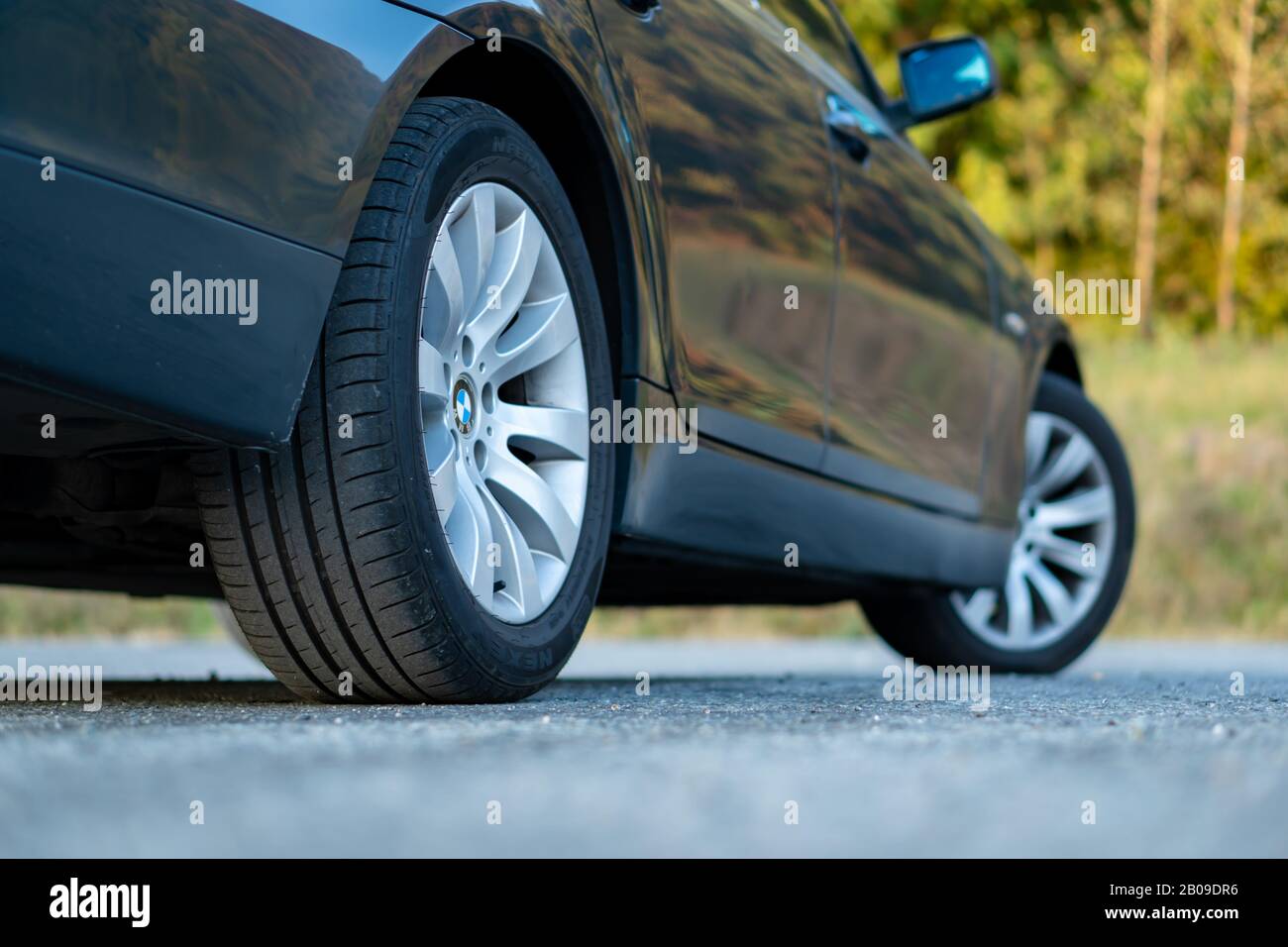 Alloy wheels with tires mounted on. Close-up photo of profile model ...