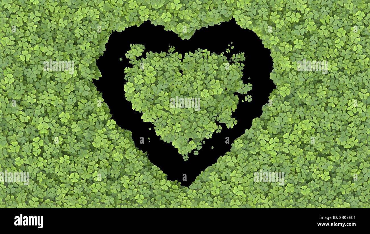 Green clover covering the screen in the shape of a heart on black ...