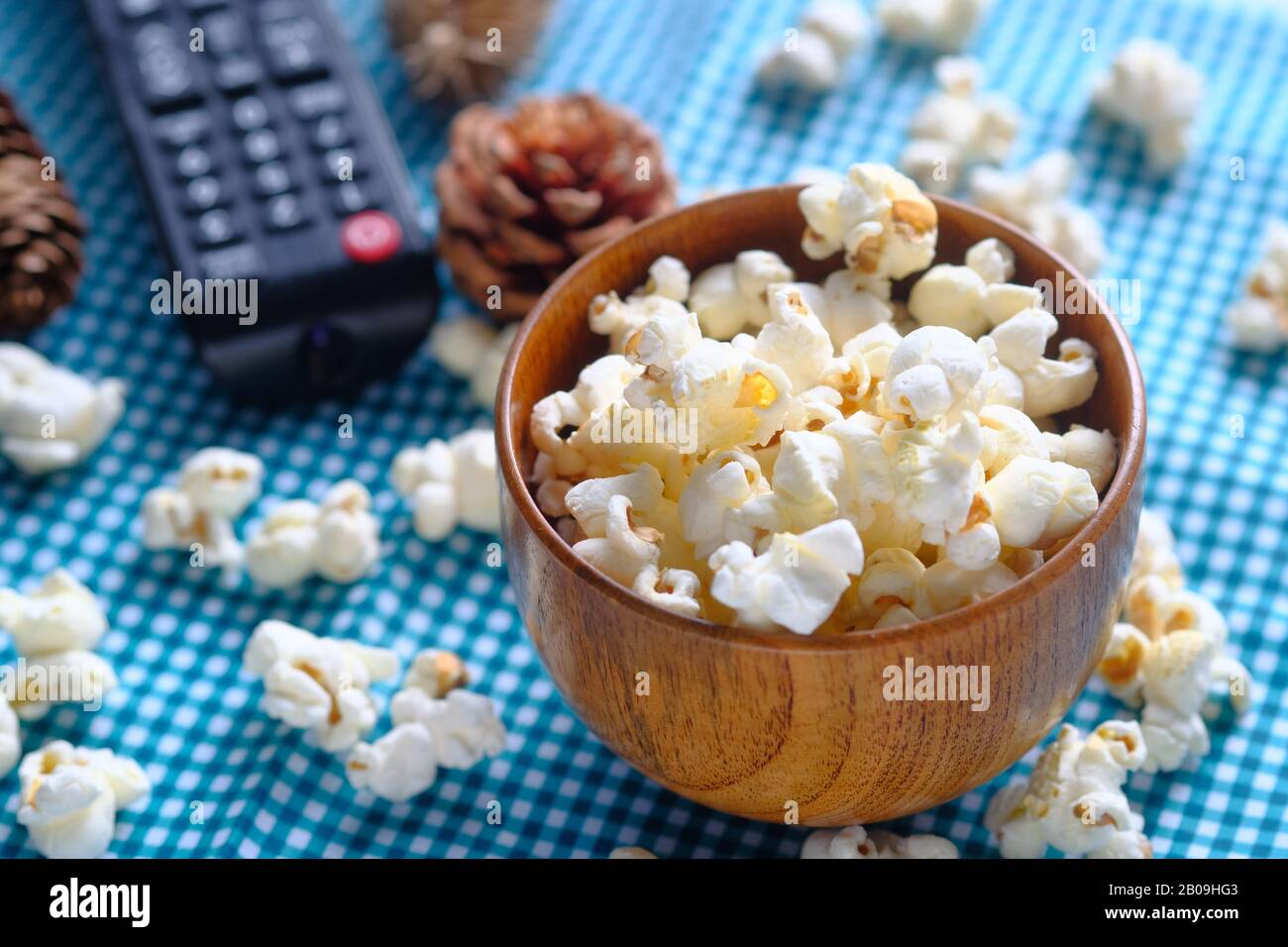 top view of popcorn and tv remote on table Stock Photo - Alamy