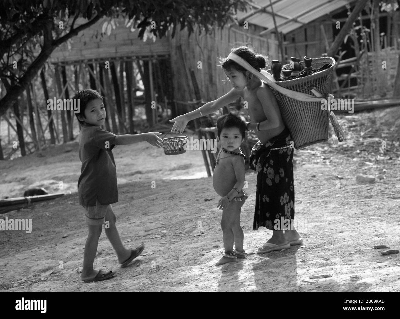 Children from Murong community carry out their daily chores at a ...