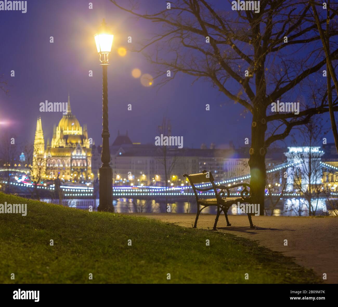 Budapest, Hungary - Bench and lamp post in a park at Buda district with ...