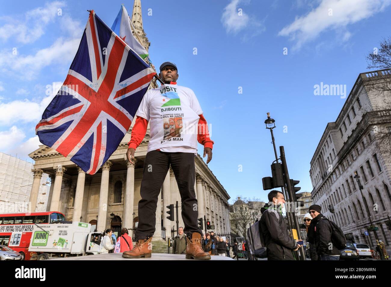 Flag man with Union Jack flag on Trafalgar Square advertising 'Visit ...