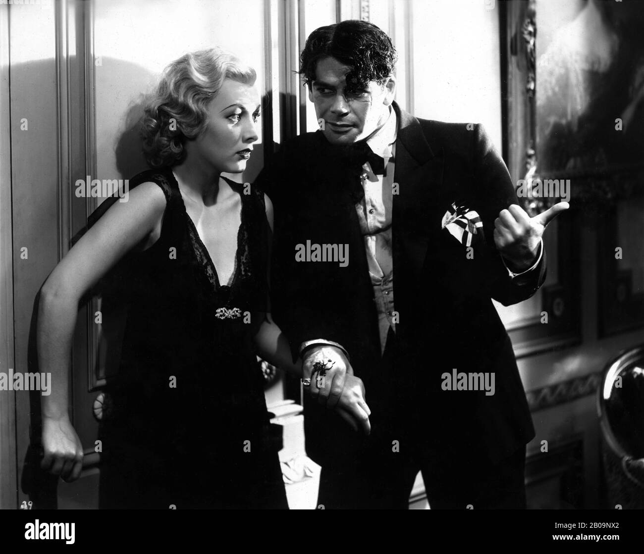 KAREN MORLEY and PAUL MUNI as Tony Camonte in SCARFACE 1932 directors ...