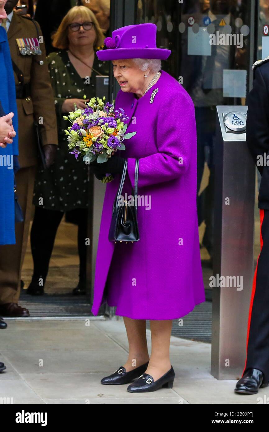 Queen Elizabeth II wearing bright purple calf-length coat and purple ...