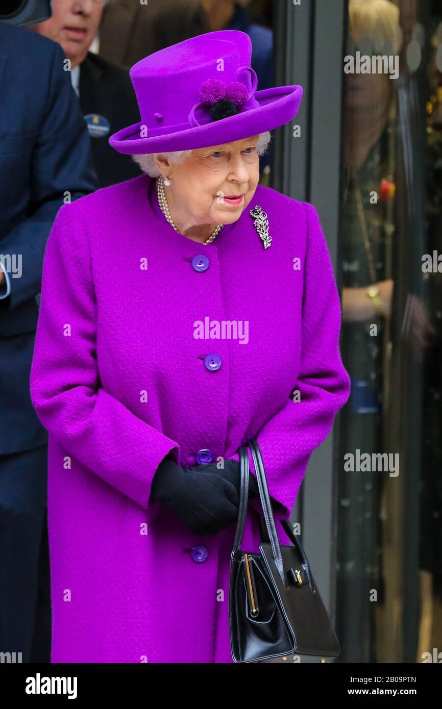 Queen Elizabeth II wearing bright purple calf-length coat and purple ...