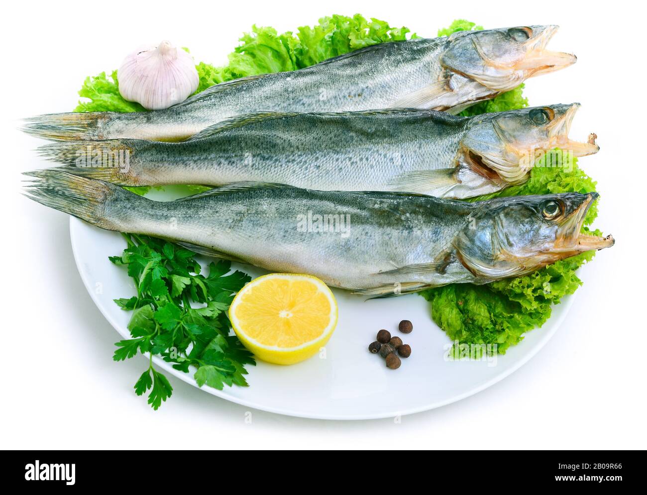 Group of dried fish at plate . Seafood Stock Photo - Alamy