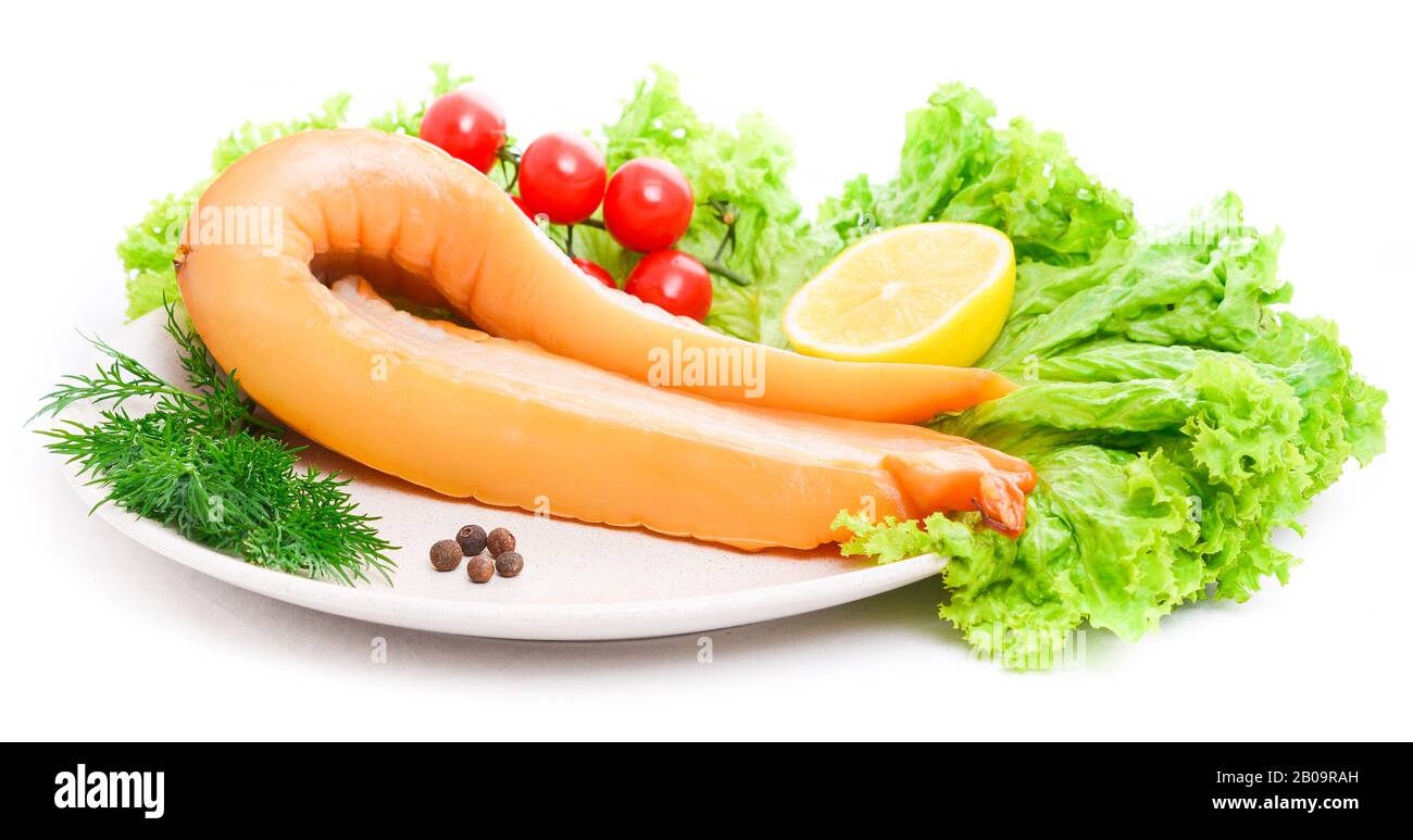 Smoked giant squid, a piece on a plate Stock Photo - Alamy