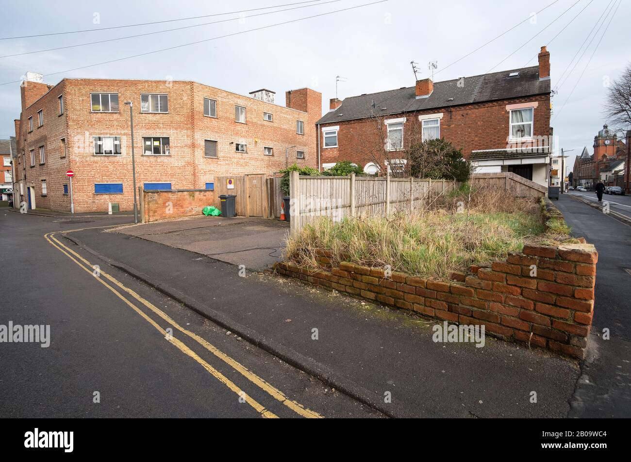 Urban garden and crumbling brick wall Stock Photo - Alamy
