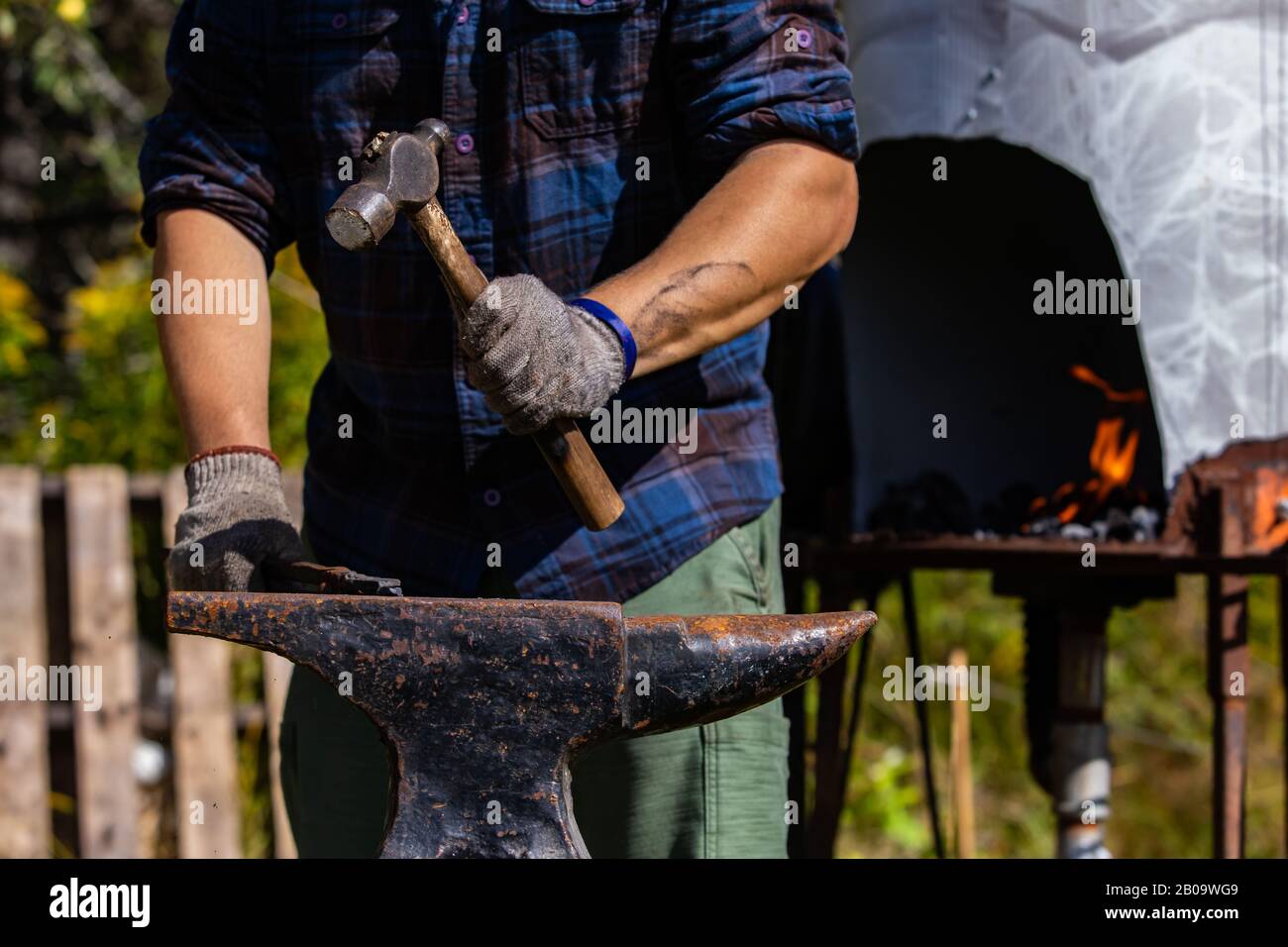 Medieval blacksmith hands process hi-res stock photography and images ...