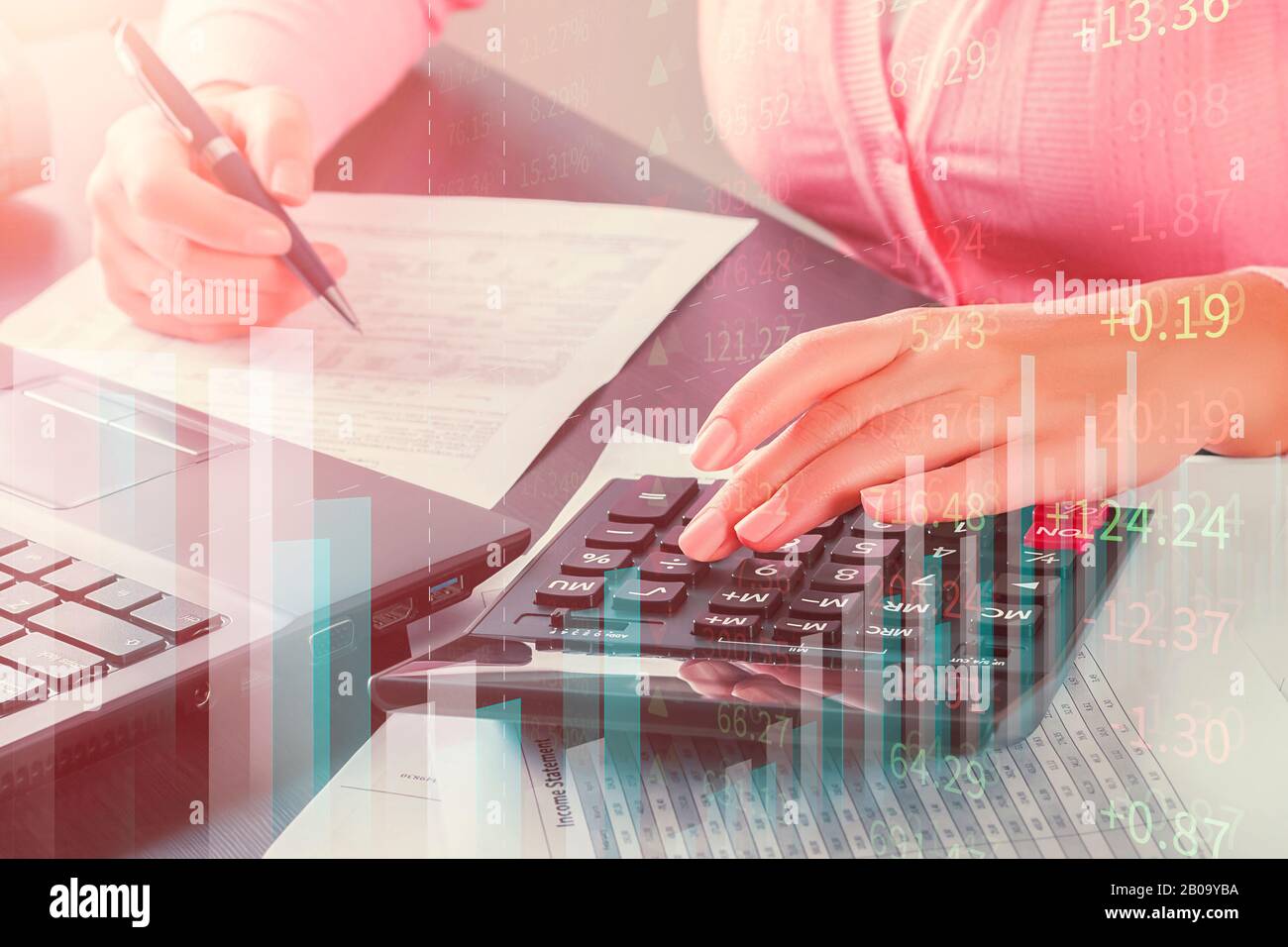 Closeup of the hands of a girl at the workplace in the office, which ...
