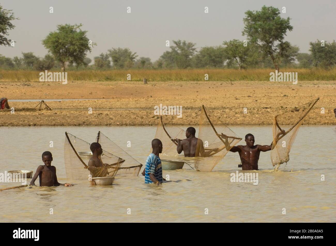 Man fishing in pond in hi-res stock photography and images - Alamy