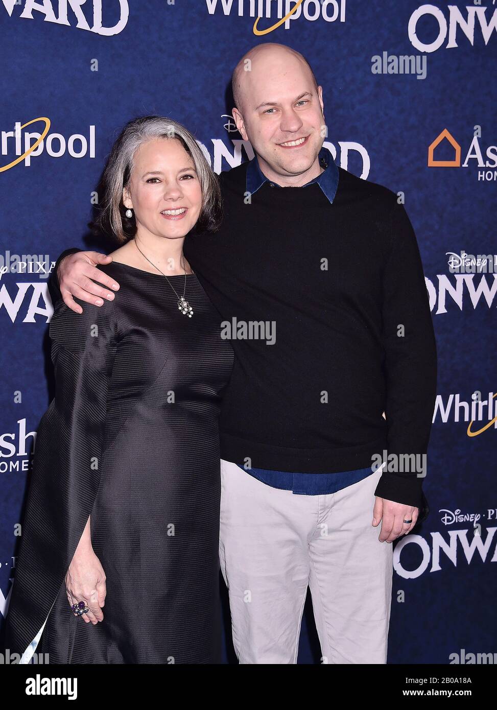 HOLLYWOOD, CA - FEBRUARY 18: Dan Scanlon (R) and Michele Scanlon attend ...
