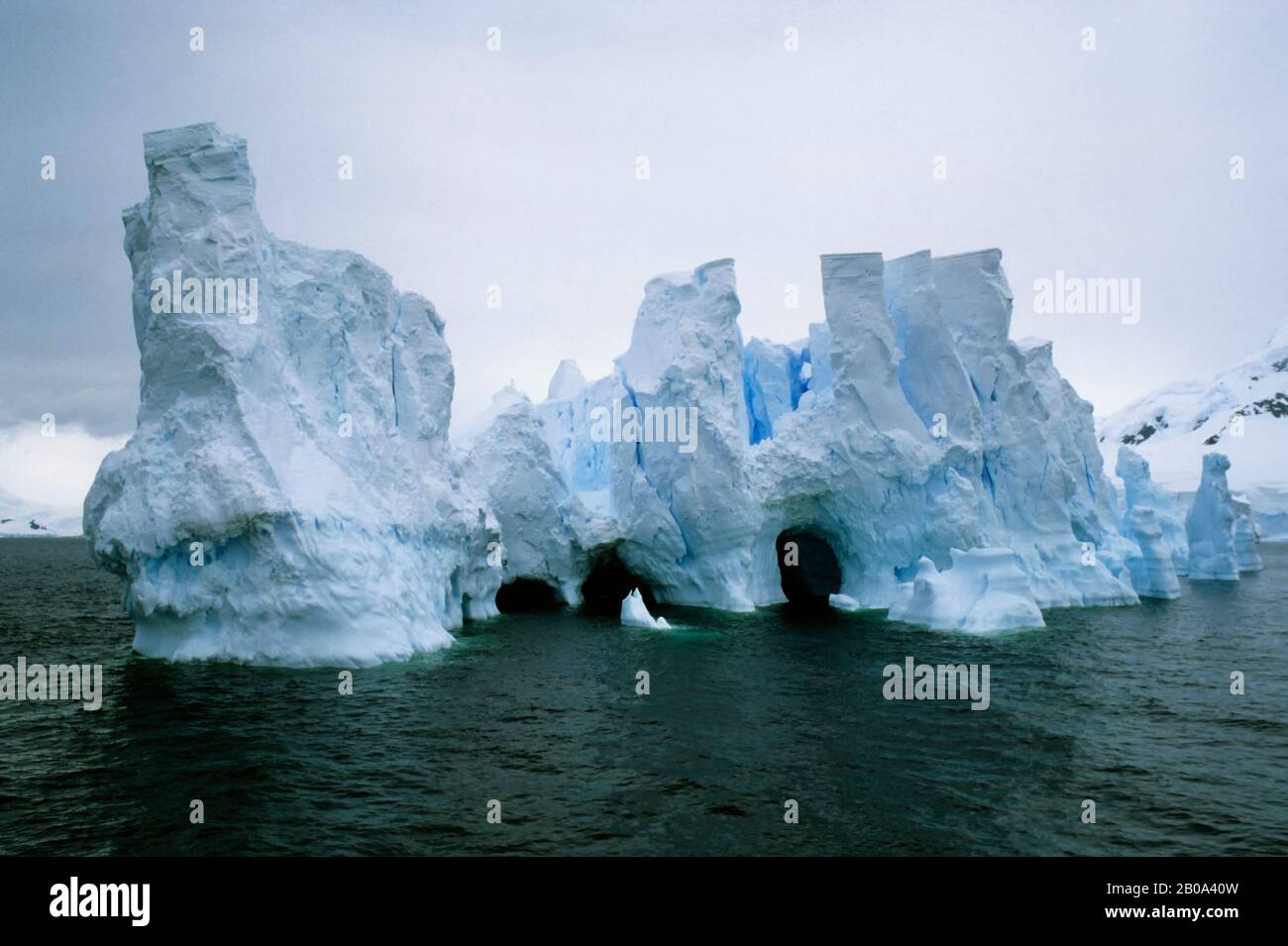 ANTARCTICA, ICEBERG IN FRONT OF PENINSULA COAST Stock Photo - Alamy