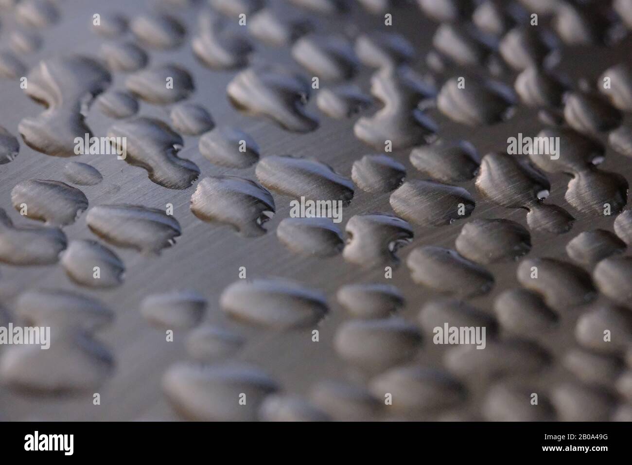 Water droplets on steel Stock Photo - Alamy