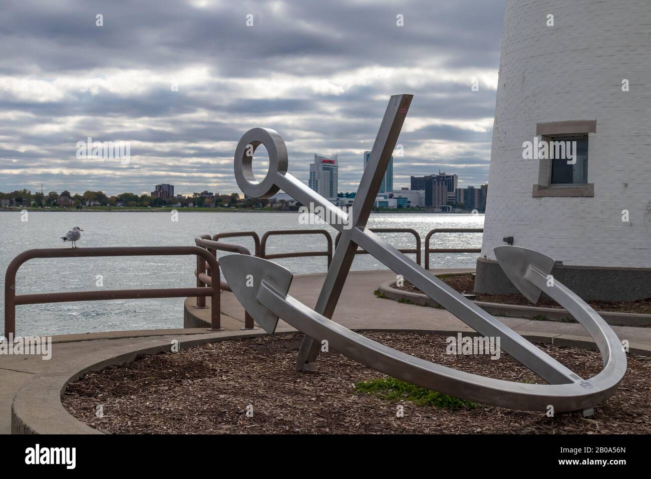 Anchor at the base of a lighthouse Stock Photo - Alamy