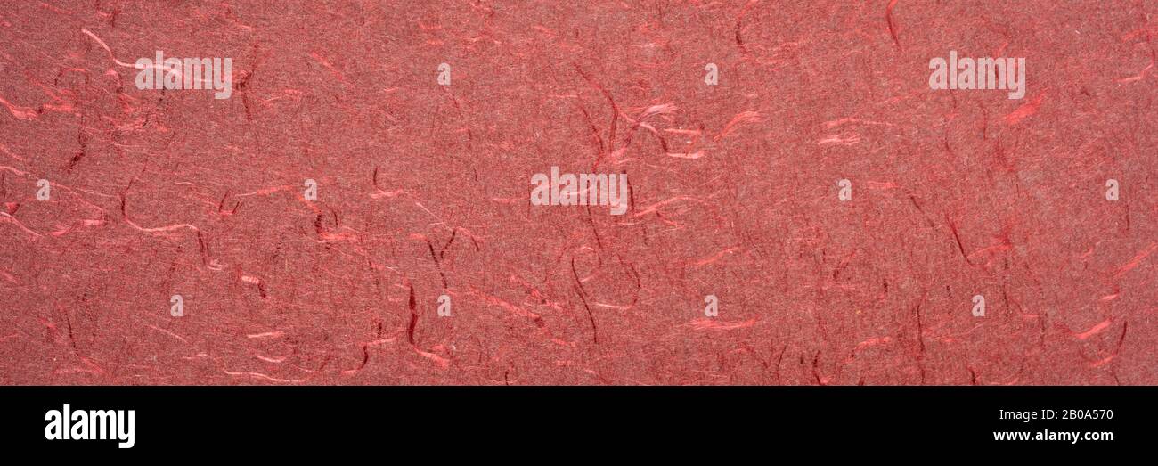 background and texture of red handmade Indian paper created from ...