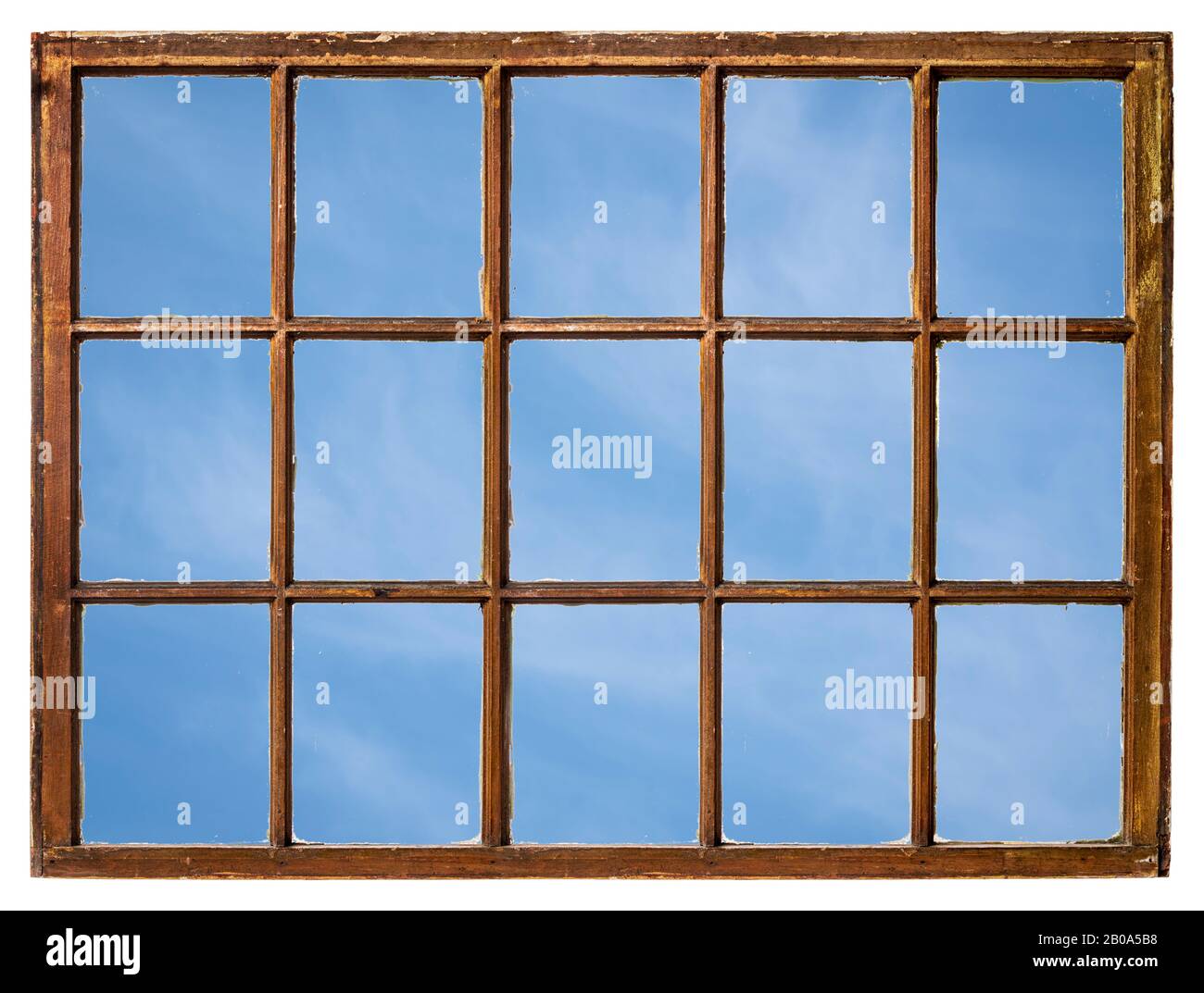 blue sky with delicate white clouds as seen from a vintage sash window ...