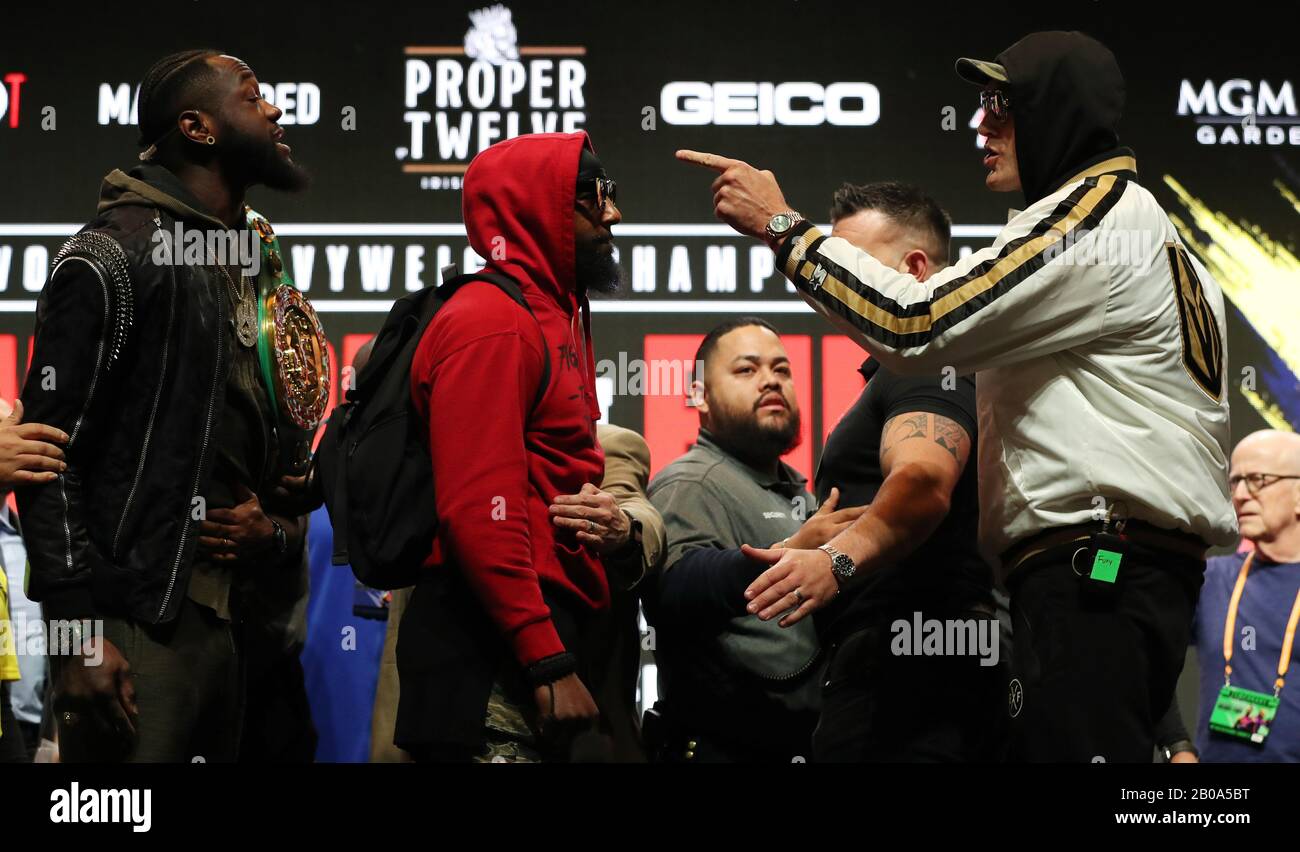 Security step in as Deontay Wilder and Tyson Fury confront each other ...