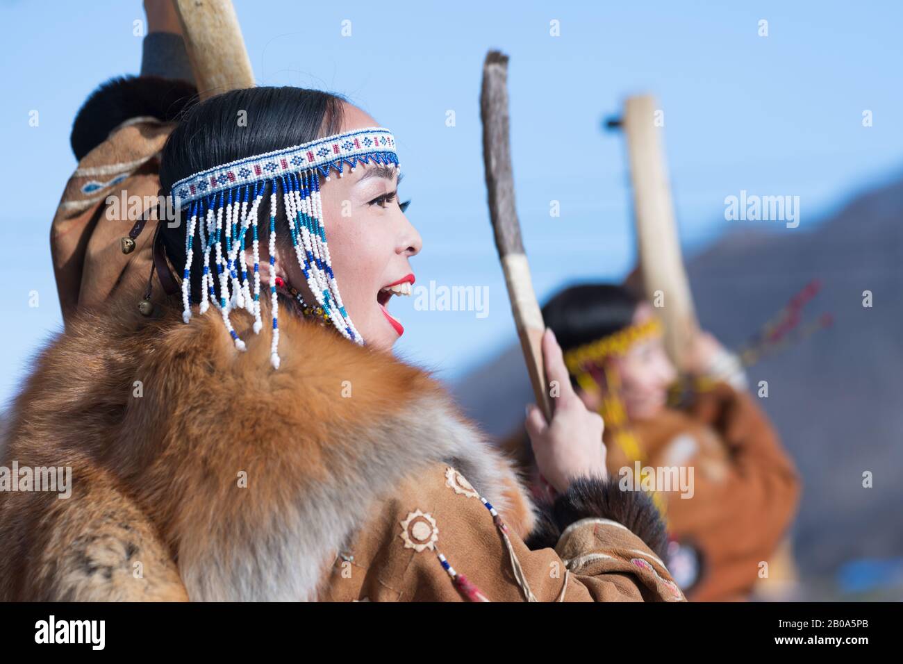 Woman dancing with tambourine in tradition clothing aboriginal people ...