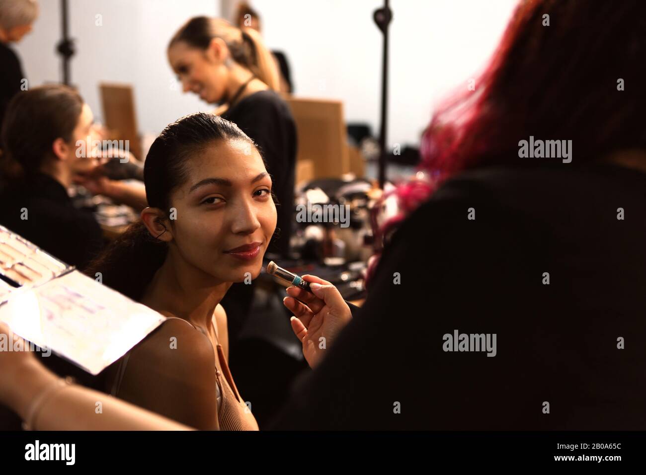 A model backstage getting ready for the University of Westminster show ...