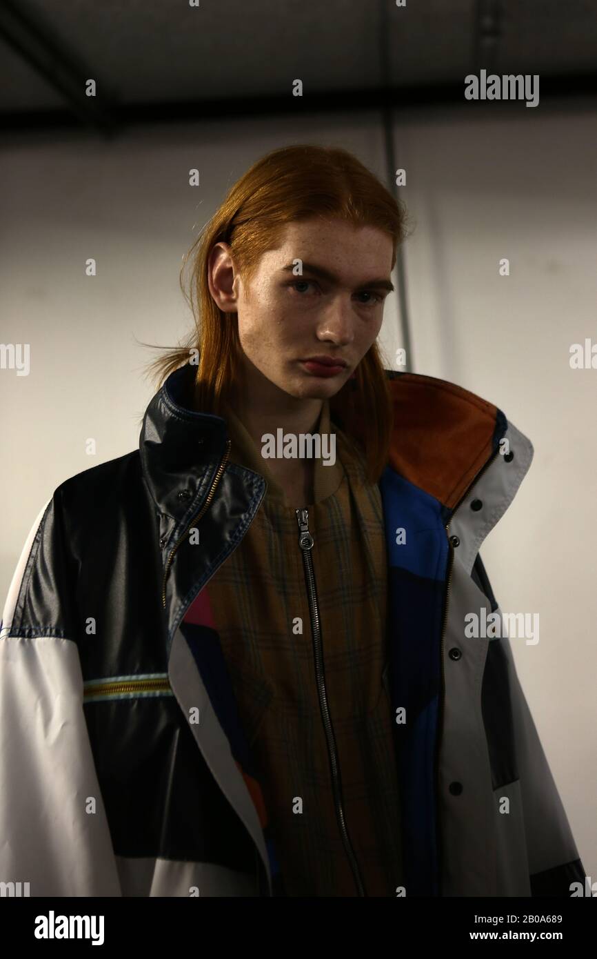 A male model backstage getting ready for the University of Westminster ...