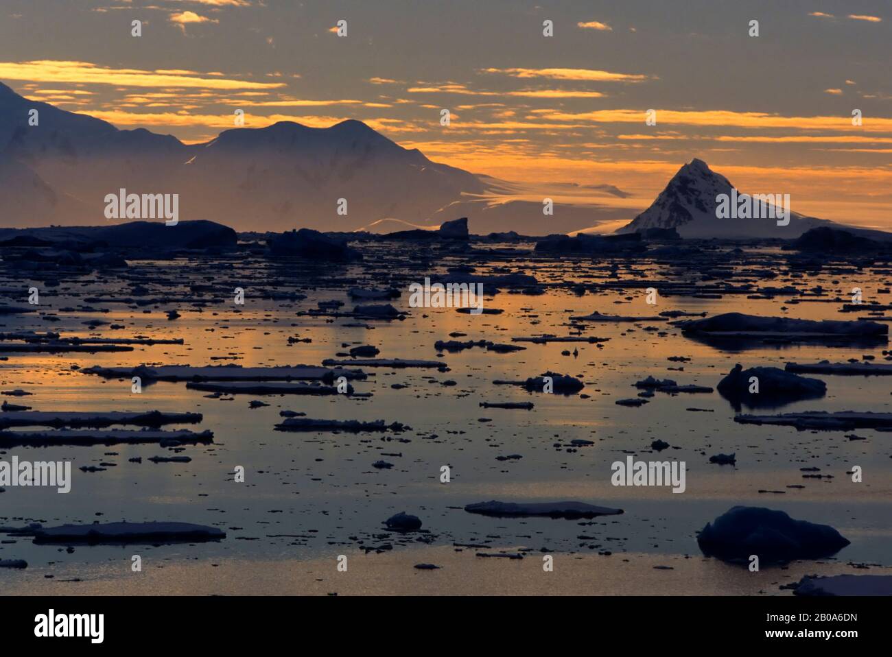 ANTARCTIC PENINSULA AREA, MOUNTAINS AND PACK ICE, IN EVENING LIGHT ...