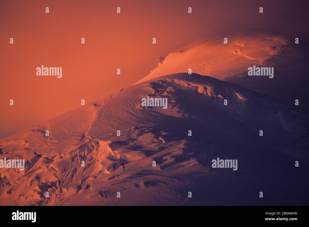 ANTARCTIC PENINSULA AREA, MIDNIGHT SUNLIGHT ON GLACIER COVERED MOUNTAIN ...
