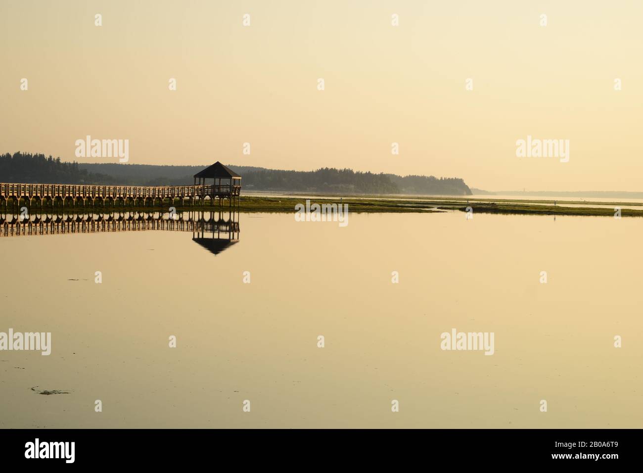 Gazebo Against Reflective Still Standing Water During Sunrise Stock ...