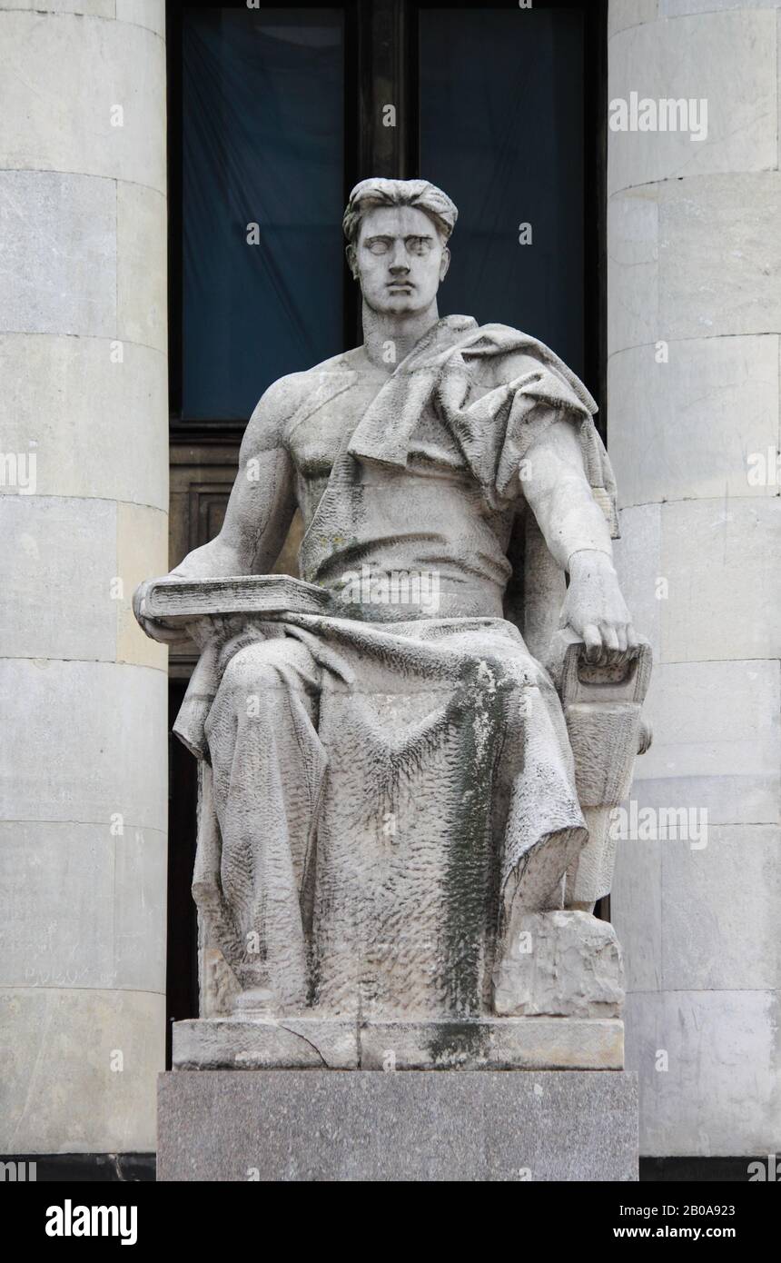 Statue in front of the Palace of culture and science in Warsaw, Poland ...
