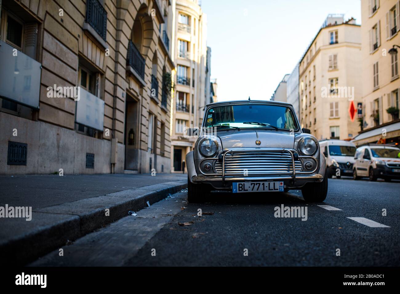 A small French car on a side street in Paris, France Stock Photo - Alamy