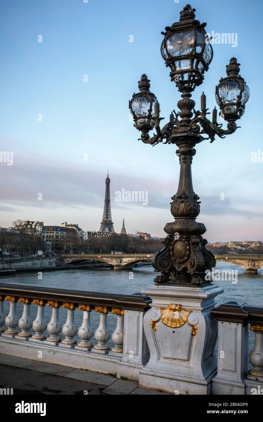 The Eiffel Tower seen from a bridge on the Seine in Paris, France Stock ...