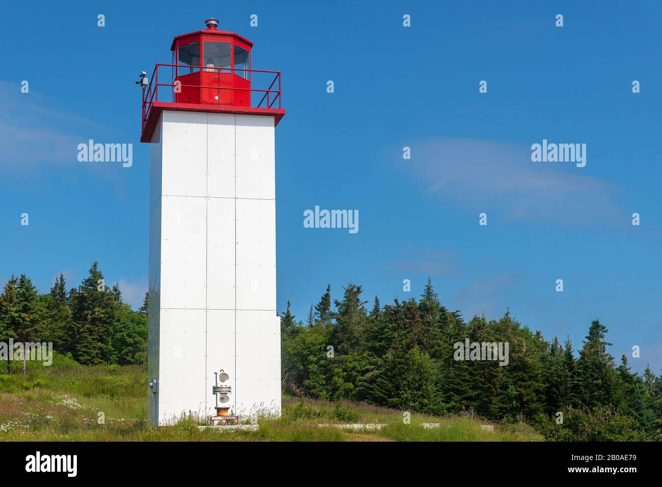 The lighthouse at Quaco Head in New Brunswick. The top houses the light ...