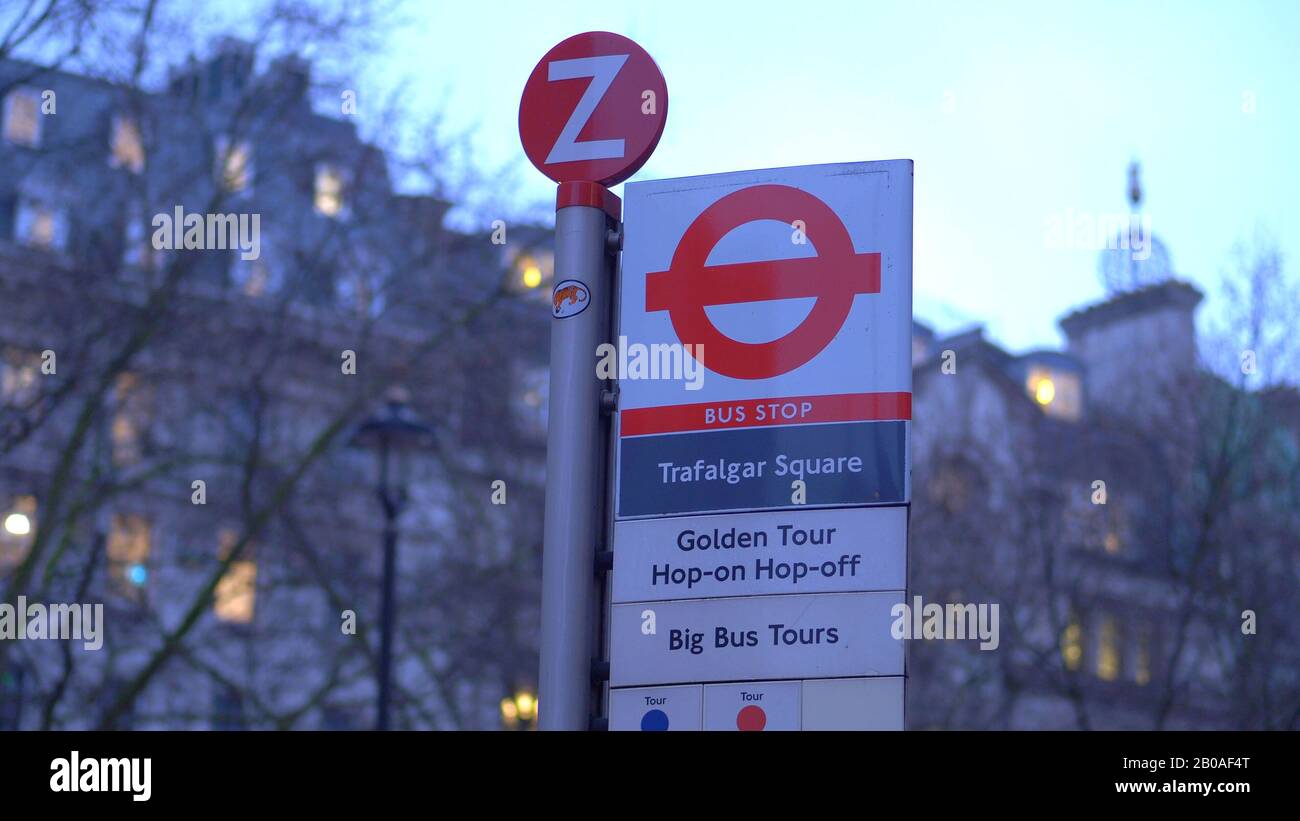 Trafalgar Square bus stop London - LONDON, ENGLAND - DECEMBER 10, 2019 ...
