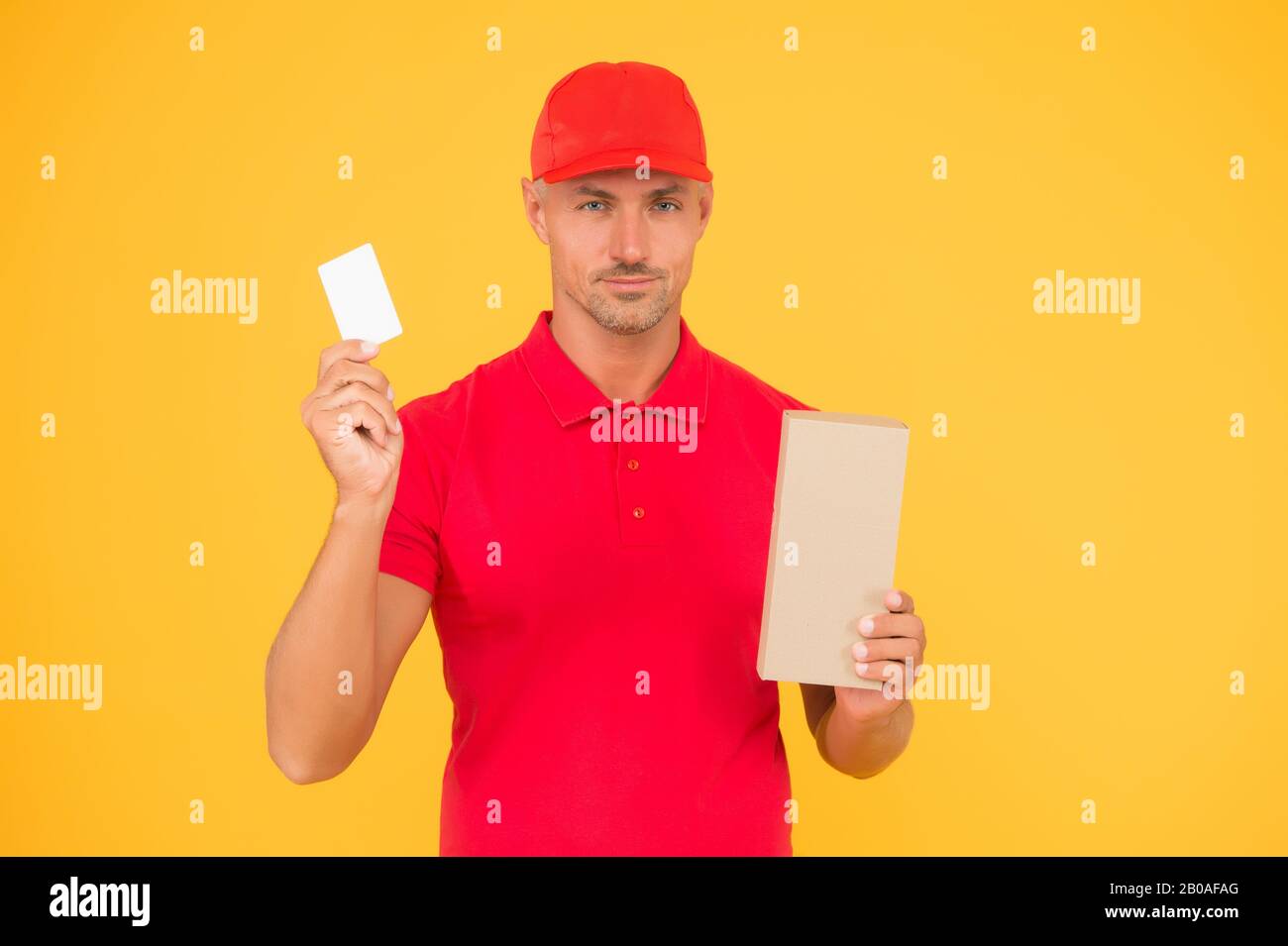 Big sale and discount. Delivery man hold discount card and box. Parcel ...