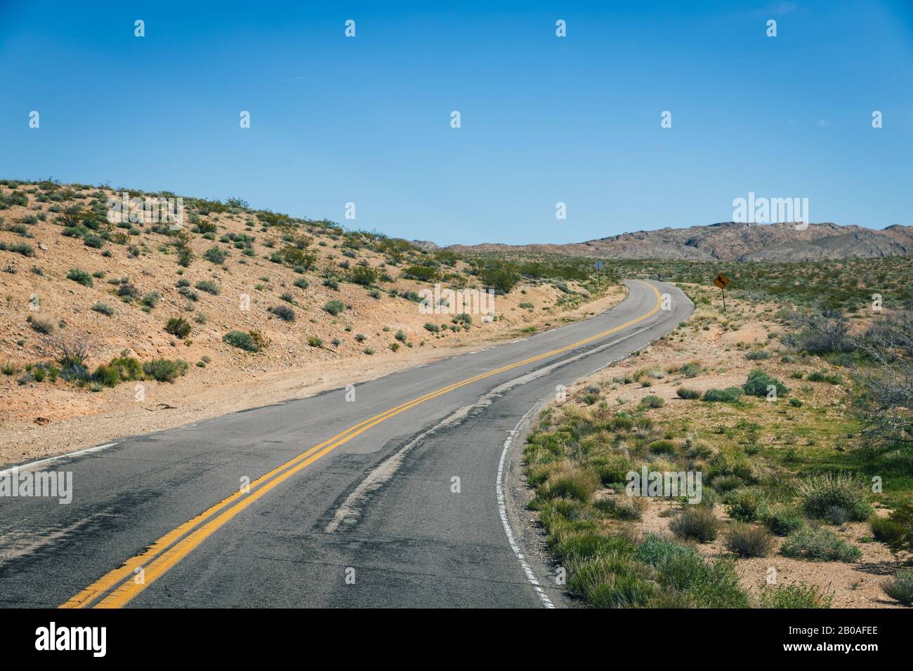 Road Winding Through Desert Landscape Stock Photo - Alamy