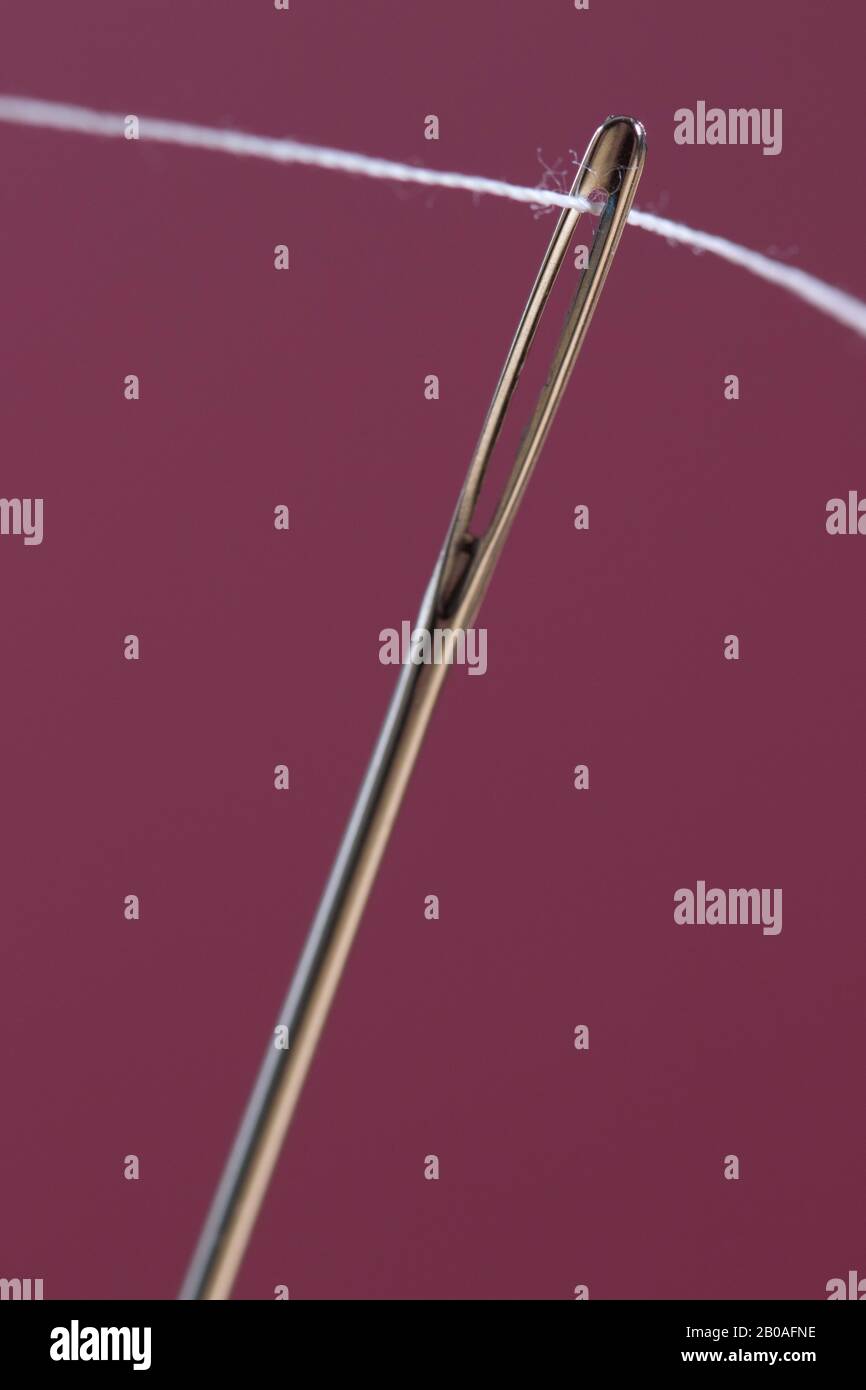 Threaded needle hi-res stock photography and images - Alamy