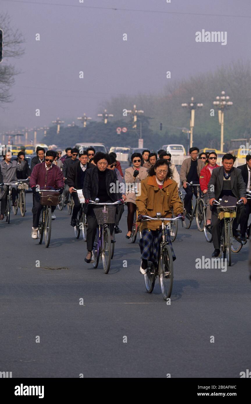 CHINA, BEIJING, STREET SCENE WITH PEOPLE ON BICYCLES Stock Photo - Alamy