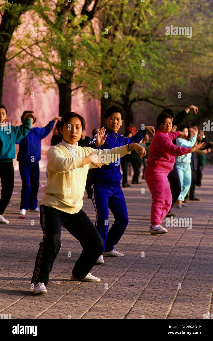 CHINA, BEIJING, PEOPLE DOING TAI CHI AT WALL OF FORBIDDEN CITY Stock ...
