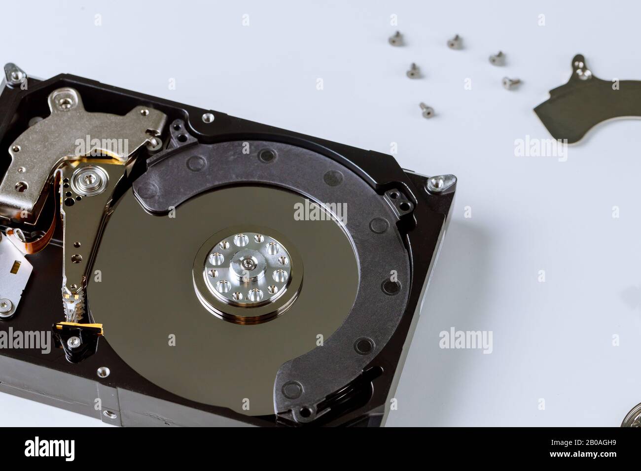 Disassembled a broken hard disk drive to repair support center Stock ...