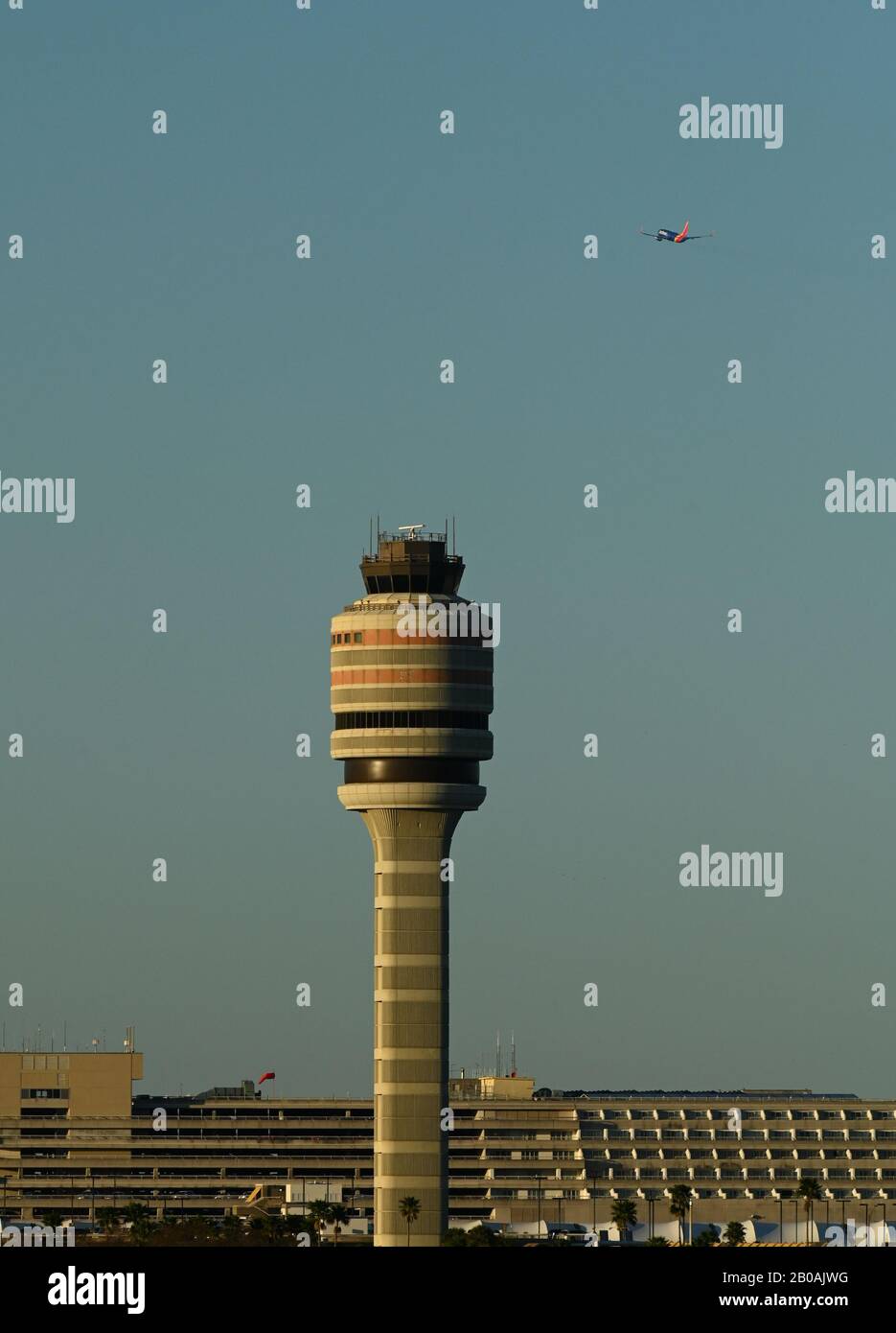 A Southwest Airlines Airplane takes off over the Orlando International ...