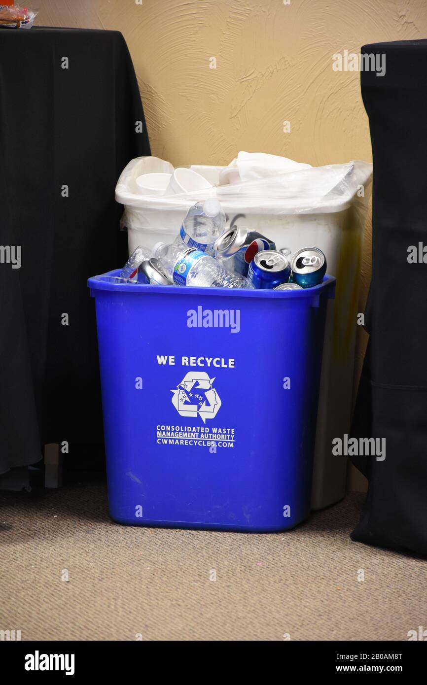 Litter and trash for disposal or recycling from homes and families with ...