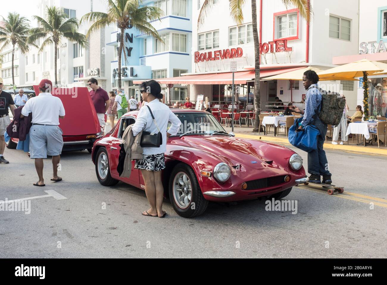 People stand around a vintage TVR Vixen show car on display during the ...