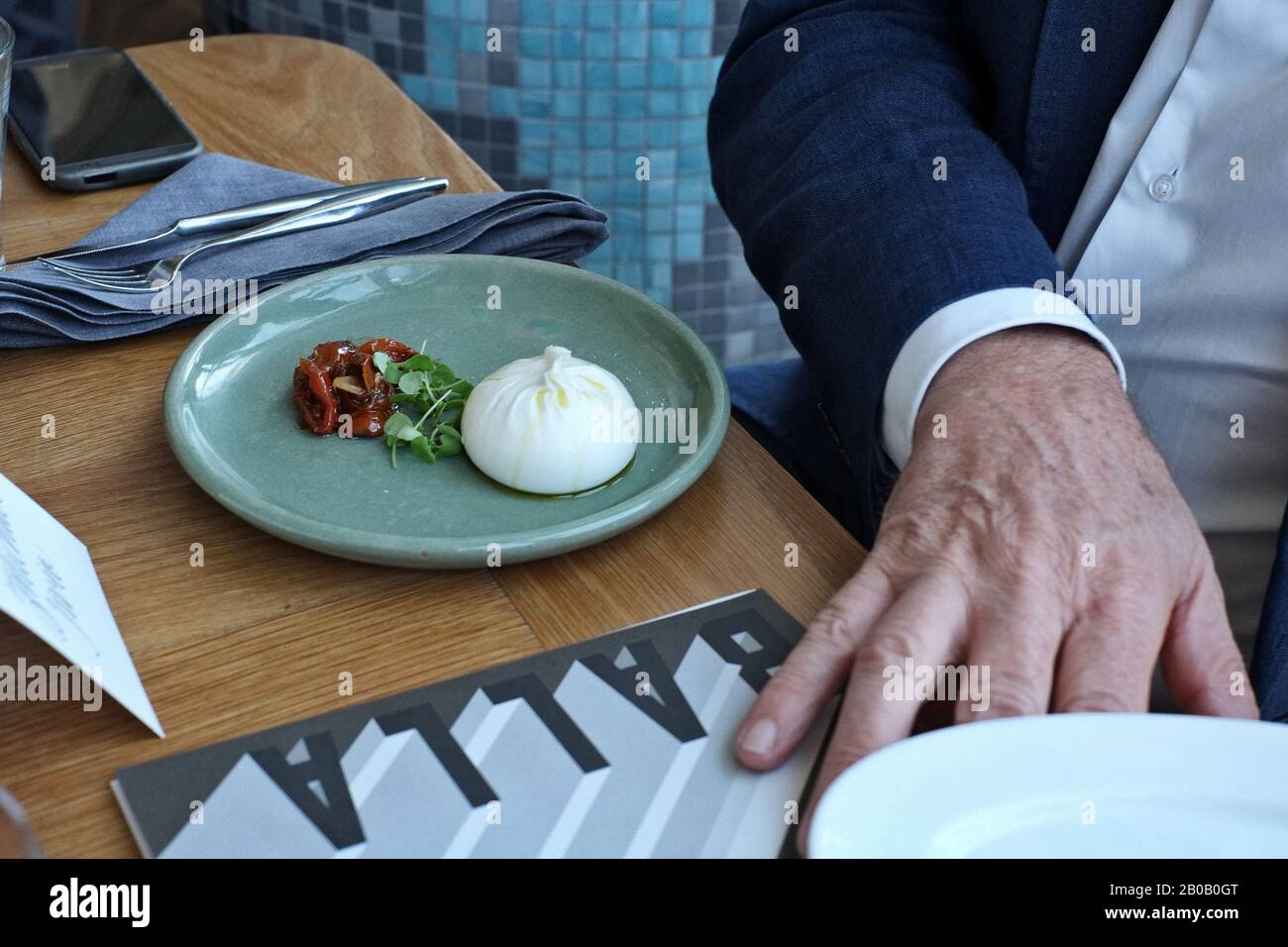 Fine dining dishes made with Italian preserved tomatoes, Burrata With ...