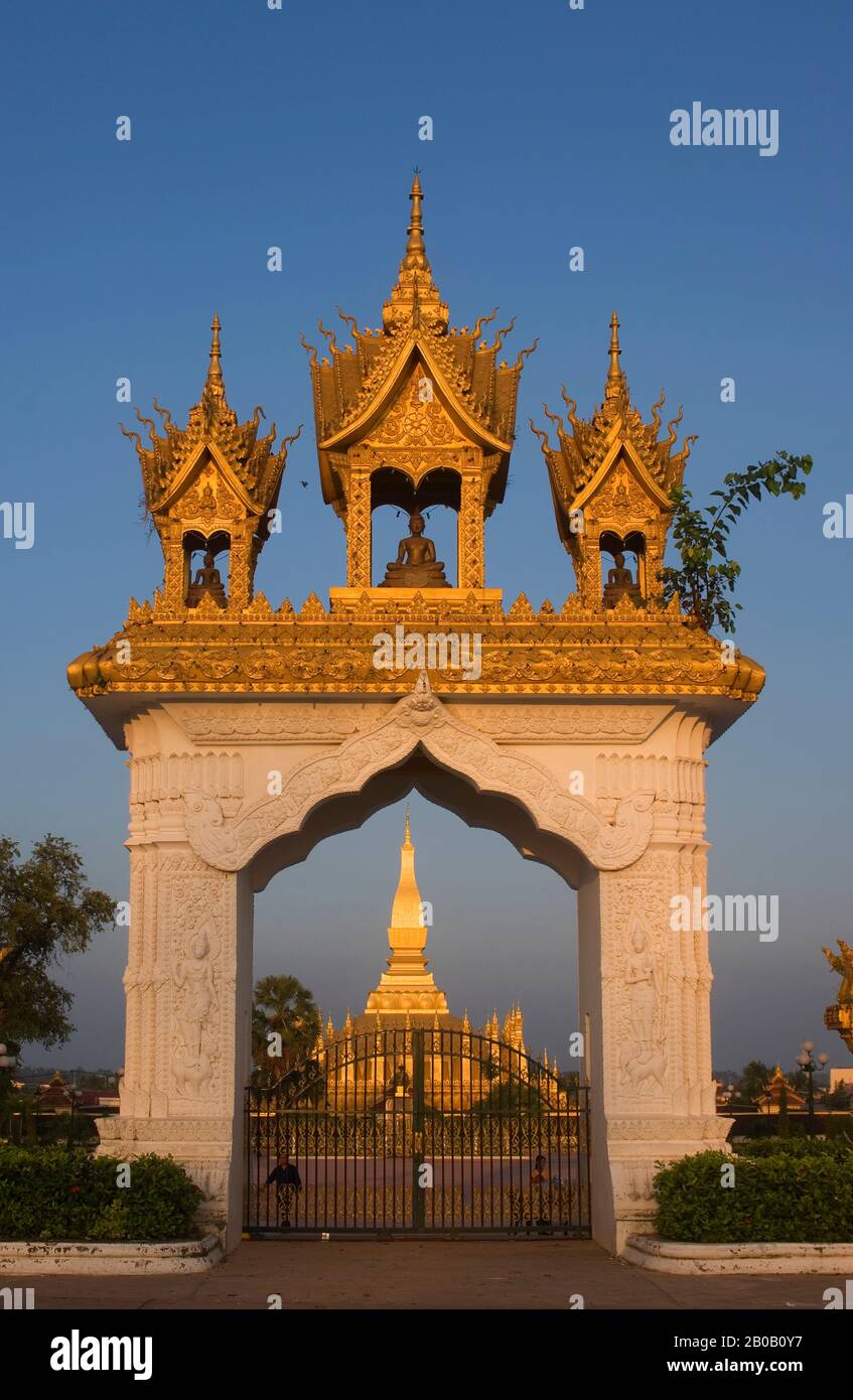 LAOS, VIENTIANE, THAT LUANG STUPA, GATE, EVENING LIGHT Stock Photo - Alamy