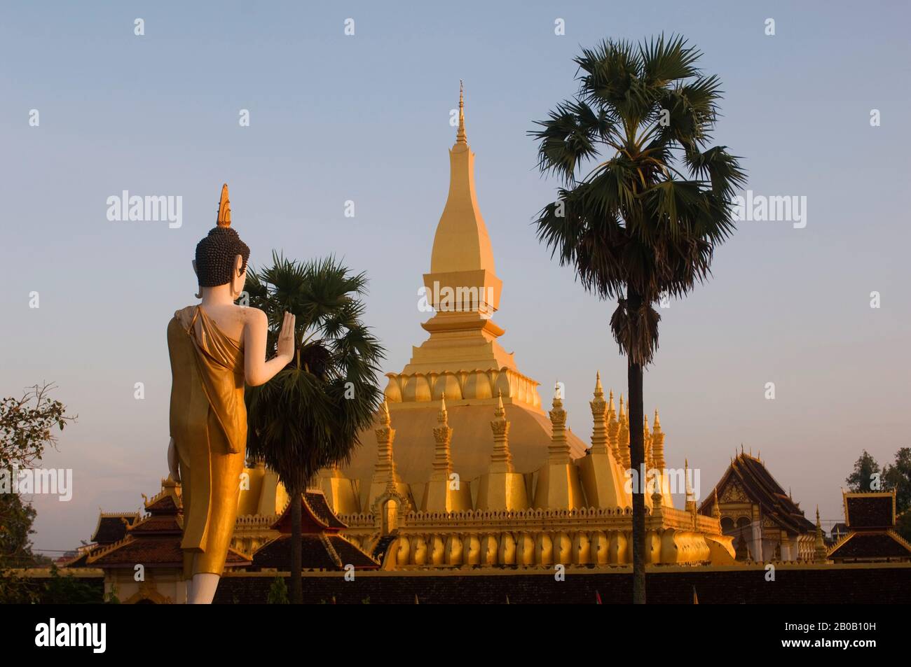 Laos temple statue gold buddha hi-res stock photography and images - Alamy