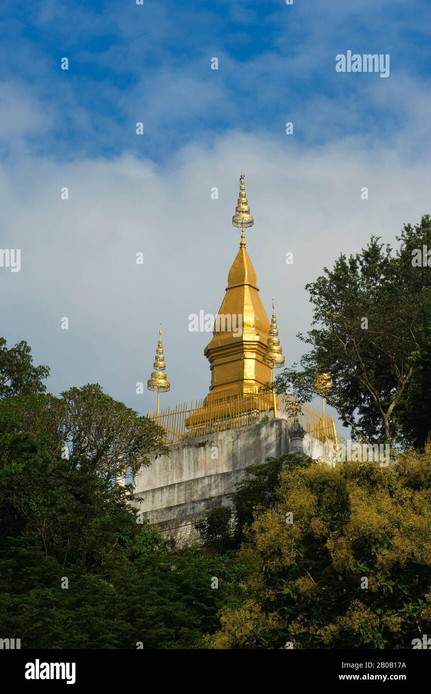 LAOS, LUANG PRABANG, VIEW OF PHOUSI HILL WITH PHOUSI STUPA FROM TEMPLE ...